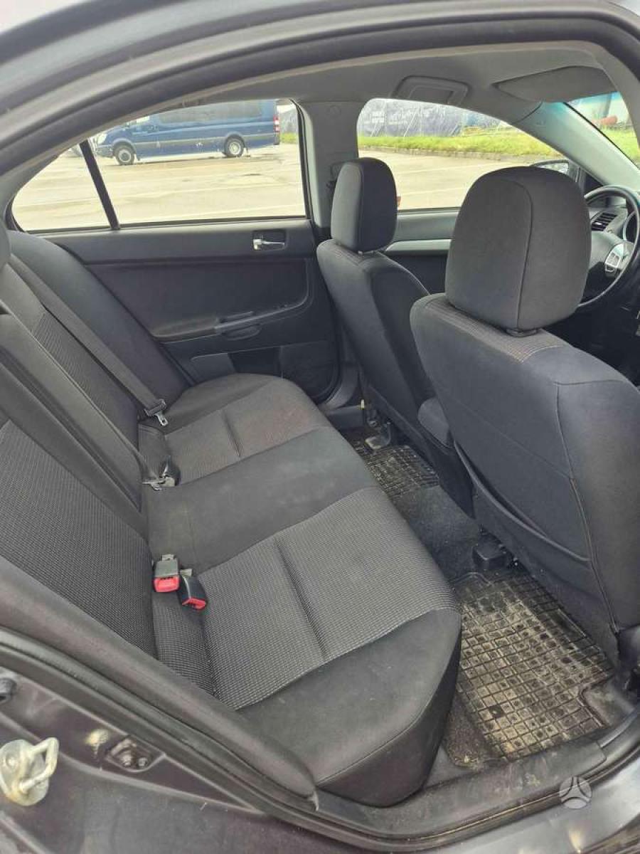 Grey Mitsubishi Lancer 2008 in Pakruojis, with an engine capacity of 1.97 L and mileage of 235 thousand km for 1850 €, photo 15 on AUTOMOTO.COM.LV