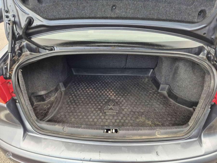 Grey Mitsubishi Lancer 2008 in Pakruojis, with an engine capacity of 1.97 L and mileage of 235 thousand km for 1850 €, photo 16 on AUTOMOTO.COM.LV