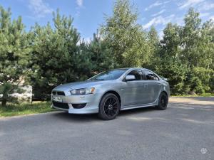Pelēks Mitsubishi Lancer 2008 Viļņa, ar dzinēja tilpumu 1.80 L un nobraukumu 200 tūkst. km par 1950 €, foto  vietnē AUTOMOTO.COM.LV