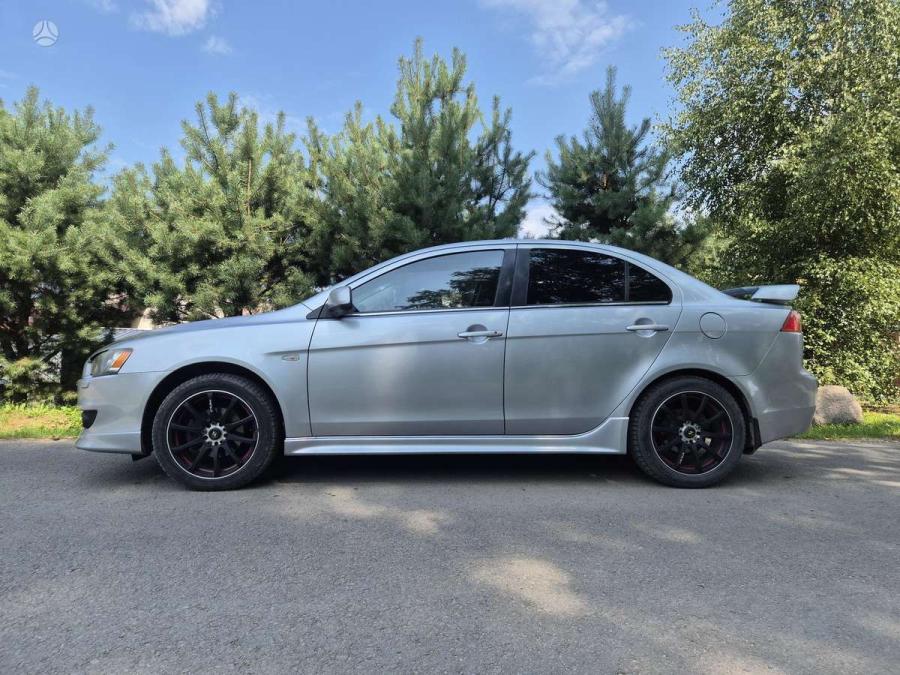 Pelēks Mitsubishi Lancer 2008 Viļņa, ar dzinēja tilpumu 1.80 L un nobraukumu 200 tūkst. km par 1950 €, foto 3 vietnē AUTOMOTO.COM.LV