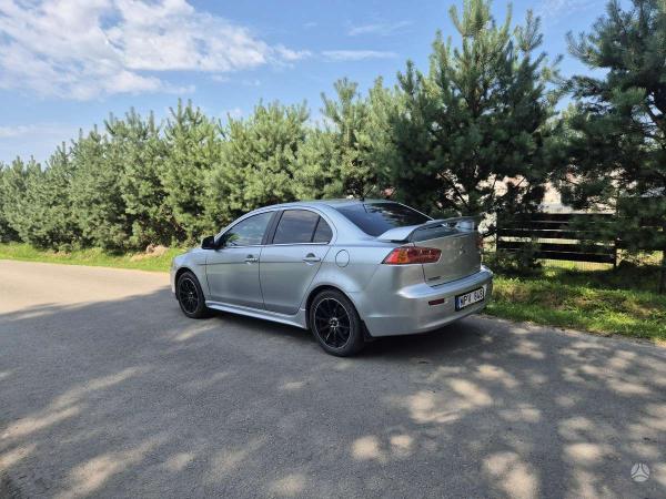 Pelēks Mitsubishi Lancer 2008 Viļņa, ar dzinēja tilpumu 1.80 L un nobraukumu 200 tūkst. km par 1950 €, foto 3 vietnē AUTOMOTO.COM.LV