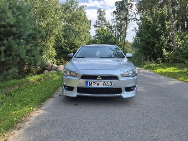 Pelēks Mitsubishi Lancer 2008 Viļņa, ar dzinēja tilpumu 1.80 L un nobraukumu 200 tūkst. km par 1950 €, foto 6 vietnē AUTOMOTO.COM.LV