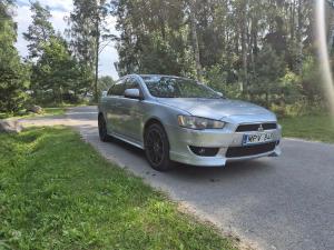 Pelēks Mitsubishi Lancer 2008 Viļņa, ar dzinēja tilpumu 1.80 L un nobraukumu 200 tūkst. km par 1950 €, foto 8 vietnē AUTOMOTO.COM.LV