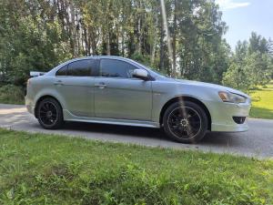 Pelēks Mitsubishi Lancer 2008 Viļņa, ar dzinēja tilpumu 1.80 L un nobraukumu 200 tūkst. km par 1950 €, foto 9 vietnē AUTOMOTO.COM.LV