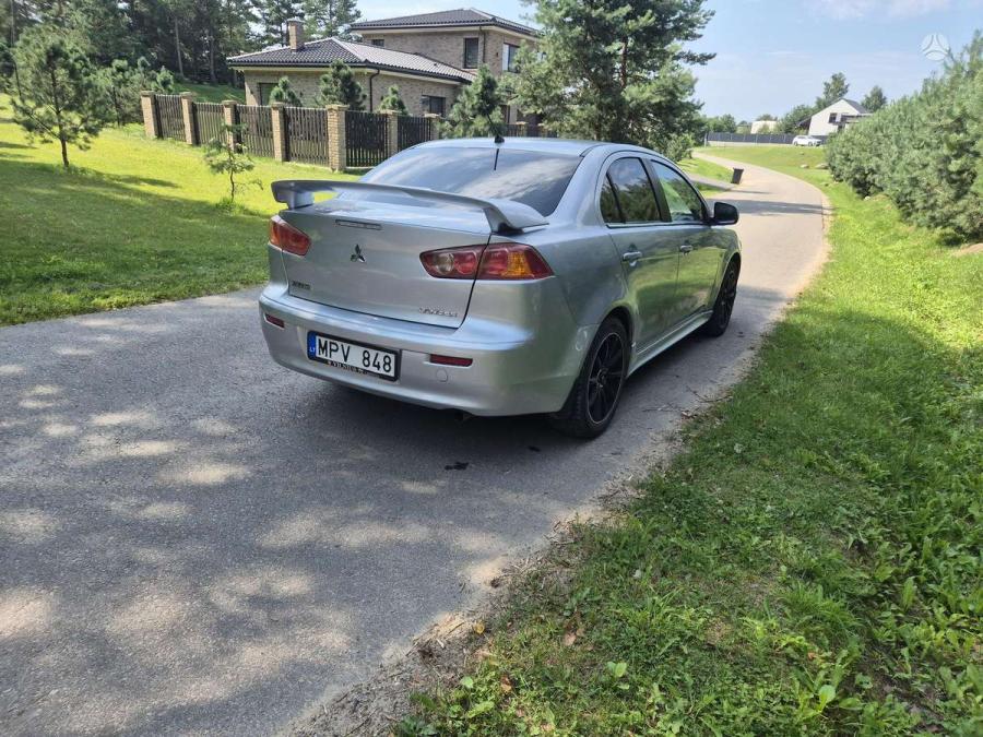 Pelēks Mitsubishi Lancer 2008 Viļņa, ar dzinēja tilpumu 1.80 L un nobraukumu 200 tūkst. km par 1950 €, foto 11 vietnē AUTOMOTO.COM.LV