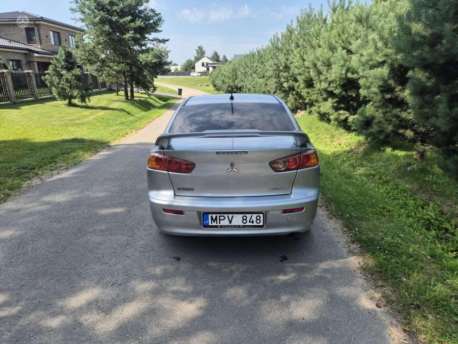 Pelēks Mitsubishi Lancer 2008 Viļņa, ar dzinēja tilpumu 1.80 L un nobraukumu 200 tūkst. km par 1950 €, foto 12 vietnē AUTOMOTO.COM.LV