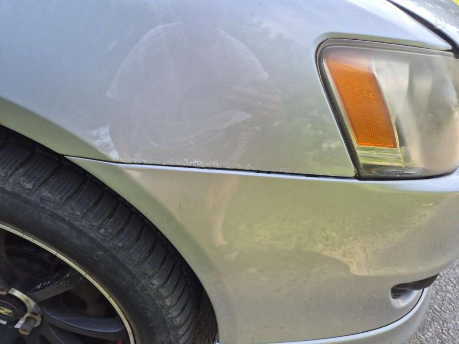 Pelēks Mitsubishi Lancer 2008 Viļņa, ar dzinēja tilpumu 1.80 L un nobraukumu 200 tūkst. km par 1950 €, foto 13 vietnē AUTOMOTO.COM.LV