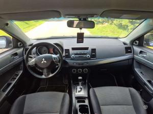 Pelēks Mitsubishi Lancer 2008 Viļņa, ar dzinēja tilpumu 1.80 L un nobraukumu 200 tūkst. km par 1950 €, foto 16 vietnē AUTOMOTO.COM.LV