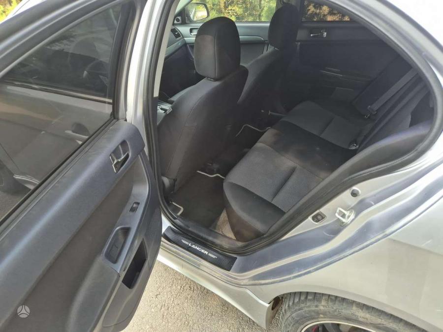 Pelēks Mitsubishi Lancer 2008 Viļņa, ar dzinēja tilpumu 1.80 L un nobraukumu 200 tūkst. km par 1950 €, foto 18 vietnē AUTOMOTO.COM.LV