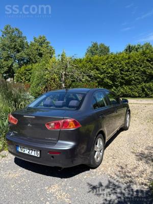 Pelēks Mitsubishi Lancer 2008 Rīga, ar dzinēja tilpumu 1.50 L un nobraukumu 250 tūkst. km par 1800 €, foto  vietnē AUTOMOTO.COM.LV