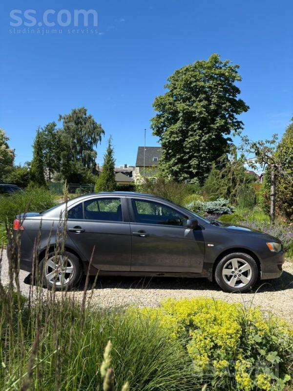 Grey Mitsubishi Lancer 2008 in Riga, with an engine capacity of 1.50 L and mileage of 250 thousand km for 1800 €, photo 2 on AUTOMOTO.COM.LV