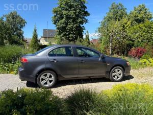 Pelēks Mitsubishi Lancer 2008 Rīga, ar dzinēja tilpumu 1.50 L un nobraukumu 250 tūkst. km par 1800 €, foto 6 vietnē AUTOMOTO.COM.LV