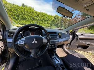 Pelēks Mitsubishi Lancer 2008 Rīga, ar dzinēja tilpumu 1.50 L un nobraukumu 250 tūkst. km par 1800 €, foto 10 vietnē AUTOMOTO.COM.LV