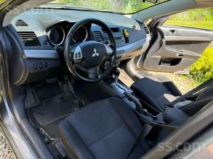 Pelēks Mitsubishi Lancer 2008 Rīga, ar dzinēja tilpumu 1.50 L un nobraukumu 250 tūkst. km par 1800 €, foto 12 vietnē AUTOMOTO.COM.LV