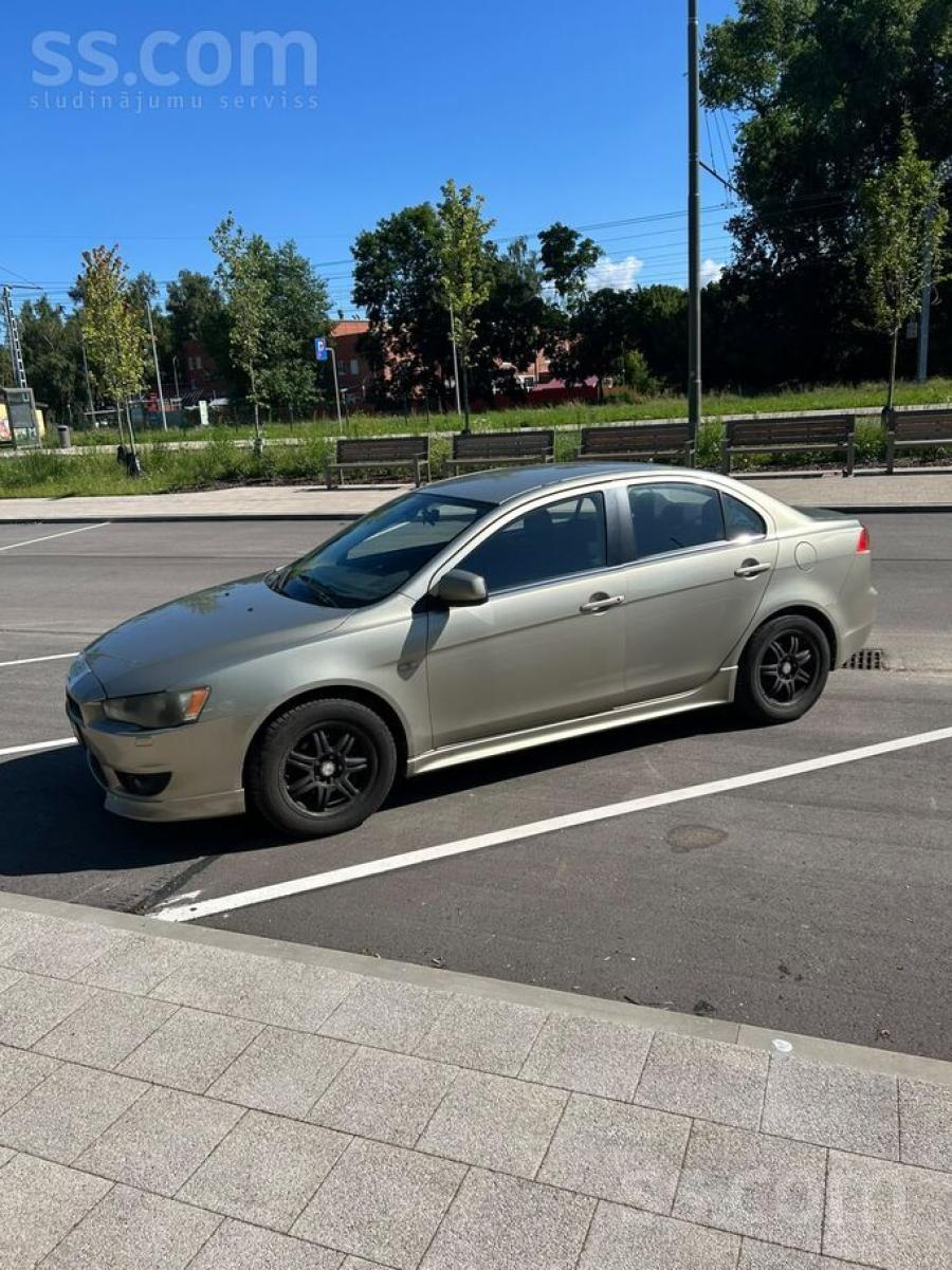 Pelēks Mitsubishi Lancer 2008 Rīga, ar dzinēja tilpumu 1.80 L un nobraukumu 243 tūkst. km par 800 €, foto 4 vietnē AUTOMOTO.COM.LV