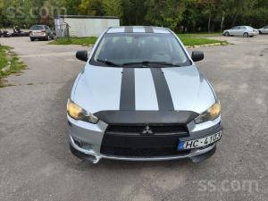 Grey Mitsubishi Lancer 2008 in Riga, with an engine capacity of 1.80 L and mileage of 257 thousand km for 1100 €, photo  on AUTOMOTO.COM.LV