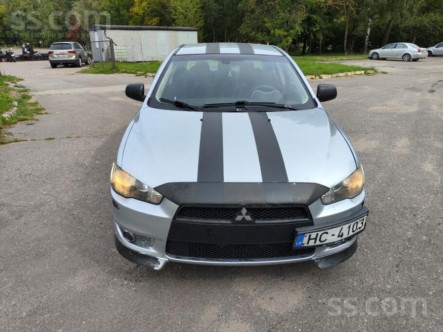 Pelēks Mitsubishi Lancer 2008 Rīga, ar dzinēja tilpumu 1.80 L un nobraukumu 257 tūkst. km par 1100 €, foto 1 vietnē AUTOMOTO.COM.LV