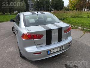 Pelēks Mitsubishi Lancer 2008 Rīga, ar dzinēja tilpumu 1.80 L un nobraukumu 257 tūkst. km par 1100 €, foto 3 vietnē AUTOMOTO.COM.LV
