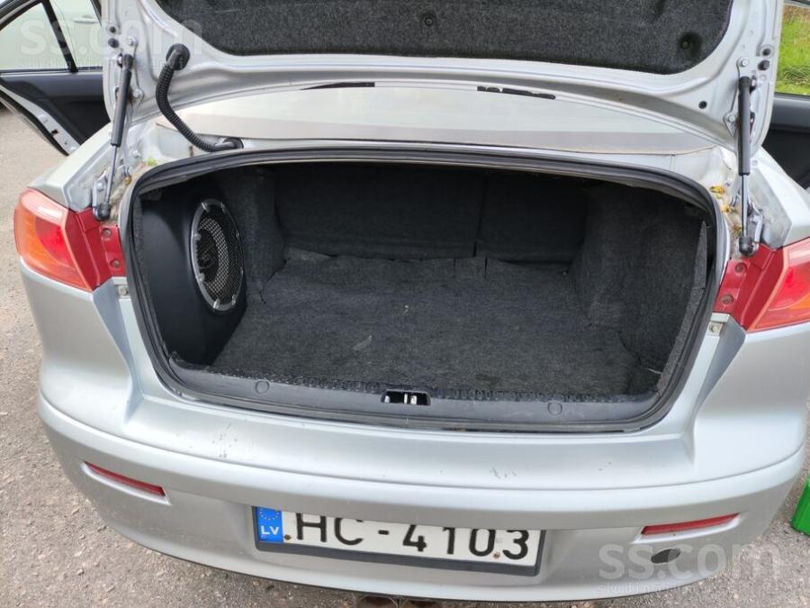 Pelēks Mitsubishi Lancer 2008 Rīga, ar dzinēja tilpumu 1.80 L un nobraukumu 257 tūkst. km par 1100 €, foto 6 vietnē AUTOMOTO.COM.LV