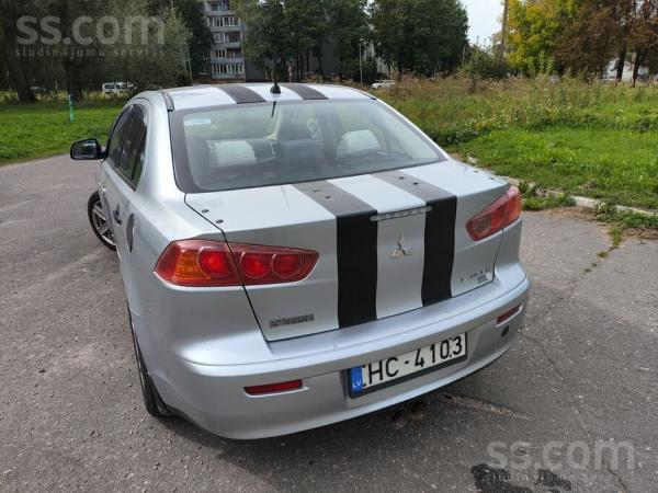 Grey Mitsubishi Lancer 2008 in Riga, with an engine capacity of 1.80 L and mileage of 257 thousand km for 700 €, photo 3 on AUTOMOTO.COM.LV