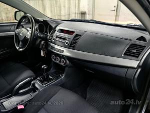 Pelēks Mitsubishi Lancer 2009 Viljandi, ar dzinēja tilpumu 1.80 L un nobraukumu 168 tūkst. km par 3990 €, foto 5 vietnē AUTOMOTO.COM.LV