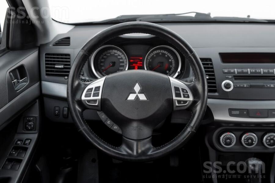 Pelēks Mitsubishi Lancer 2009 Rīga, ar dzinēja tilpumu 1.80 L un nobraukumu 103 tūkst. km par 3990 €, foto 18 vietnē AUTOMOTO.COM.LV