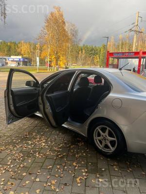Pelēks Mitsubishi Lancer 2010 Rīga, ar dzinēja tilpumu 2.00 L un nobraukumu 227 tūkst. km par 3499 €, foto 6 vietnē AUTOMOTO.COM.LV
