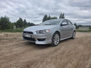 Grey Mitsubishi Lancer 2010 in Vilnius, with an engine capacity of 1.97 L and mileage of 204 thousand km for 1750 €, photo  on AUTOMOTO.COM.LV