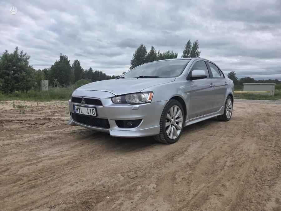 Grey Mitsubishi Lancer 2010 in Vilnius, with an engine capacity of 1.97 L and mileage of 204 thousand km for 1750 €, photo 1 on AUTOMOTO.COM.LV