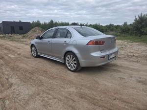 Grey Mitsubishi Lancer 2010 in Vilnius, with an engine capacity of 1.97 L and mileage of 204 thousand km for 1750 €, photo 5 on AUTOMOTO.COM.LV