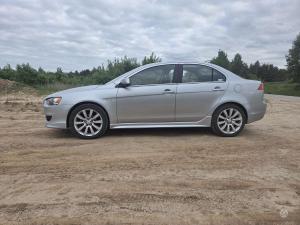 Grey Mitsubishi Lancer 2010 in Vilnius, with an engine capacity of 1.97 L and mileage of 204 thousand km for 1750 €, photo 8 on AUTOMOTO.COM.LV