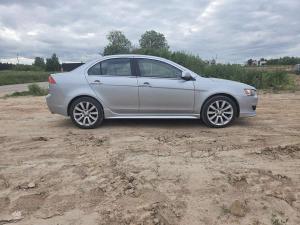 Grey Mitsubishi Lancer 2010 in Vilnius, with an engine capacity of 1.97 L and mileage of 204 thousand km for 1750 €, photo 9 on AUTOMOTO.COM.LV