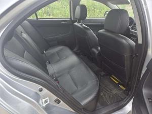 Grey Mitsubishi Lancer 2010 in Vilnius, with an engine capacity of 1.97 L and mileage of 204 thousand km for 1750 €, photo 11 on AUTOMOTO.COM.LV