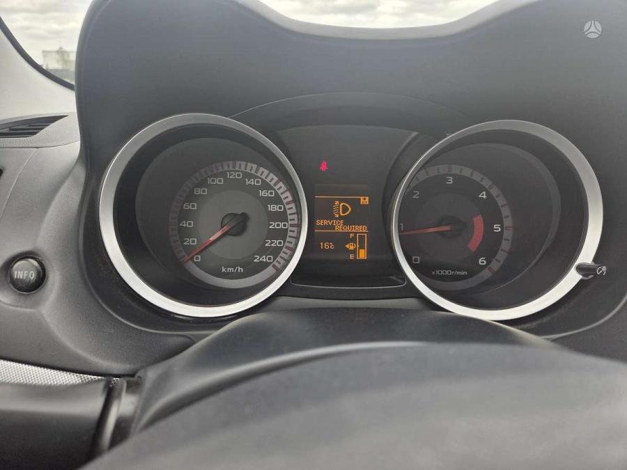 Grey Mitsubishi Lancer 2010 in Vilnius, with an engine capacity of 1.97 L and mileage of 204 thousand km for 1750 €, photo 14 on AUTOMOTO.COM.LV