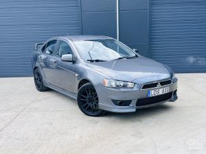 Pelēks Mitsubishi Lancer 2011 Utena, ar dzinēja tilpumu 2.00 L un nobraukumu 312 tūkst. km par 2400 €, foto  vietnē AUTOMOTO.COM.LV