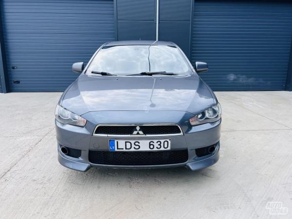 Pelēks Mitsubishi Lancer 2011 Utena, ar dzinēja tilpumu 2.00 L un nobraukumu 312 tūkst. km par 2400 €, foto 2 vietnē AUTOMOTO.COM.LV