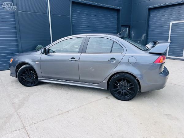 Pelēks Mitsubishi Lancer 2011 Utena, ar dzinēja tilpumu 2.00 L un nobraukumu 312 tūkst. km par 2400 €, foto 4 vietnē AUTOMOTO.COM.LV