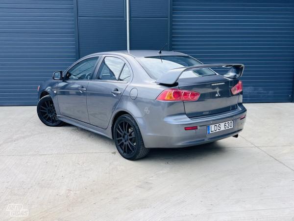 Pelēks Mitsubishi Lancer 2011 Utena, ar dzinēja tilpumu 2.00 L un nobraukumu 312 tūkst. km par 2400 €, foto 7 vietnē AUTOMOTO.COM.LV