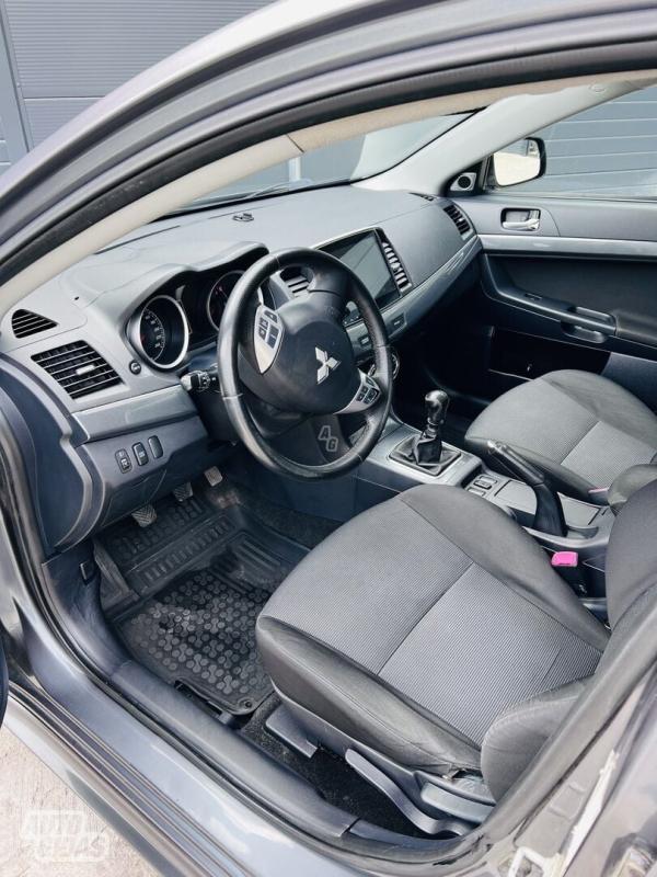 Pelēks Mitsubishi Lancer 2011 Utena, ar dzinēja tilpumu 2.00 L un nobraukumu 312 tūkst. km par 2400 €, foto 9 vietnē AUTOMOTO.COM.LV