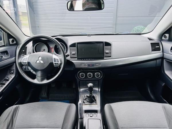 Pelēks Mitsubishi Lancer 2011 Utena, ar dzinēja tilpumu 2.00 L un nobraukumu 312 tūkst. km par 2400 €, foto 10 vietnē AUTOMOTO.COM.LV