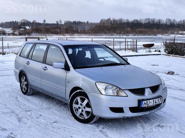Grey Mitsubishi Lancer 2003 in Jekabpils, with an engine capacity of 1.60 L and mileage of 275 thousand km for 950 €, photo 1 on AUTOMOTO.COM.LV