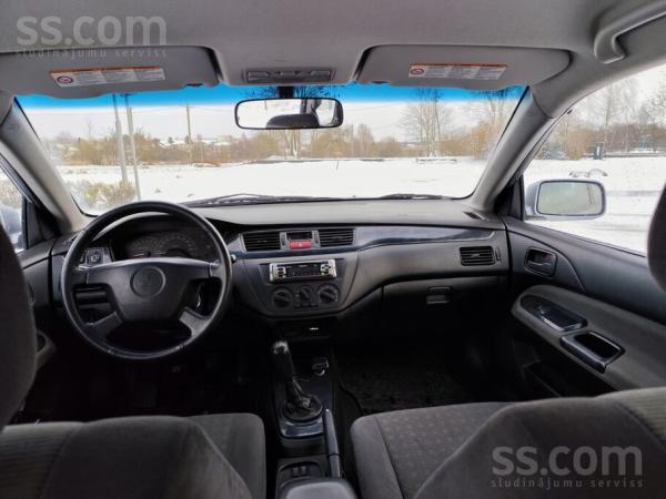 Grey Mitsubishi Lancer 2003 in Jekabpils, with an engine capacity of 1.60 L and mileage of 275 thousand km for 950 €, photo 6 on AUTOMOTO.COM.LV