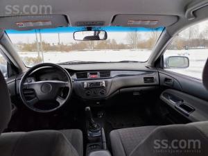 Pelēks Mitsubishi Lancer 2003 Jēkabpils, ar dzinēja tilpumu 1.60 L un nobraukumu 275 tūkst. km par 950 €, foto 6 vietnē AUTOMOTO.COM.LV