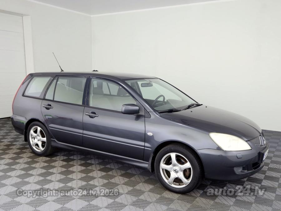 Grey Mitsubishi Lancer 2003 in Tallinn, with an engine capacity of 1.60 L and mileage of 163 thousand km for 1499 €, photo 1 on AUTOMOTO.COM.LV