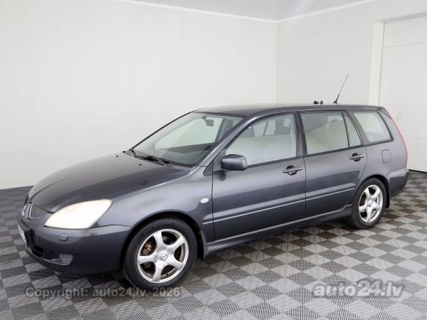 Pelēks Mitsubishi Lancer 2003 Tallina, ar dzinēja tilpumu 1.60 L un nobraukumu 163 tūkst. km par 1499 €, foto 2 vietnē AUTOMOTO.COM.LV