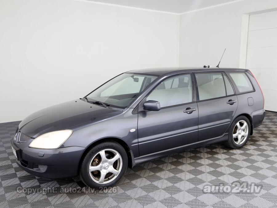 Grey Mitsubishi Lancer 2003 in Tallinn, with an engine capacity of 1.60 L and mileage of 163 thousand km for 1499 €, photo 3 on AUTOMOTO.COM.LV