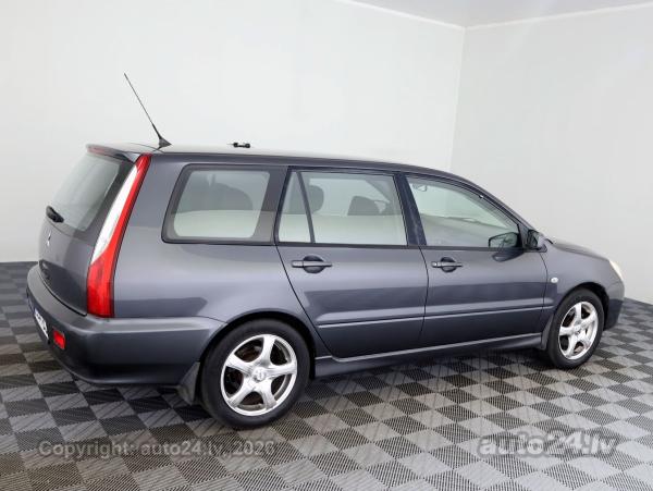 Pelēks Mitsubishi Lancer 2003 Tallina, ar dzinēja tilpumu 1.60 L un nobraukumu 163 tūkst. km par 1499 €, foto 3 vietnē AUTOMOTO.COM.LV