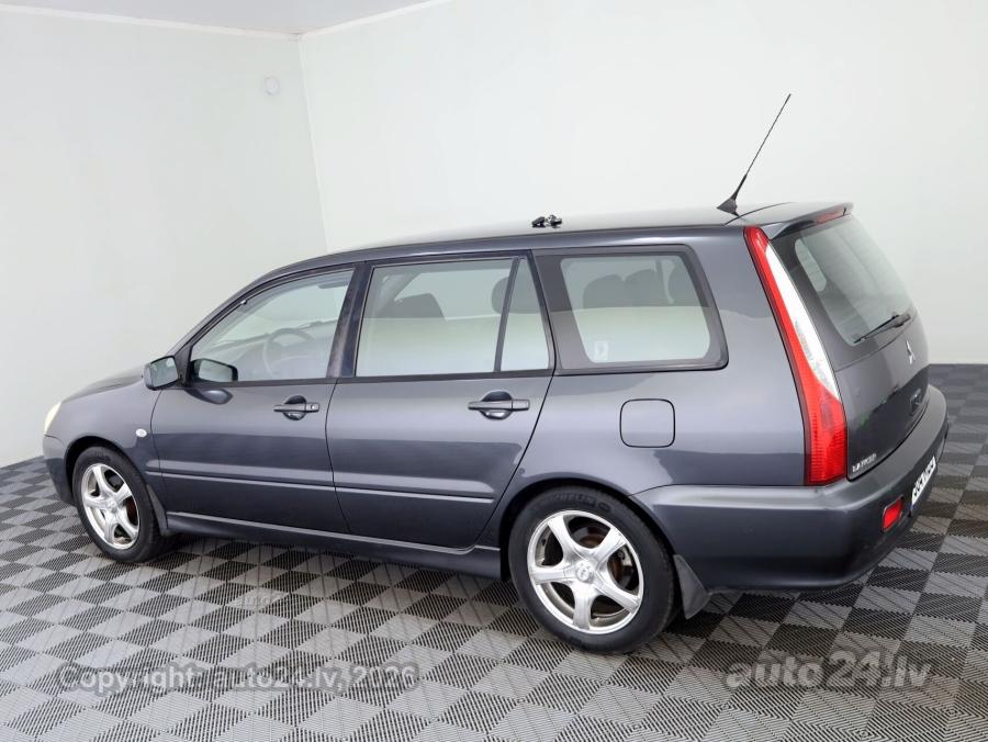 Grey Mitsubishi Lancer 2003 in Tallinn, with an engine capacity of 1.60 L and mileage of 163 thousand km for 1499 €, photo 5 on AUTOMOTO.COM.LV