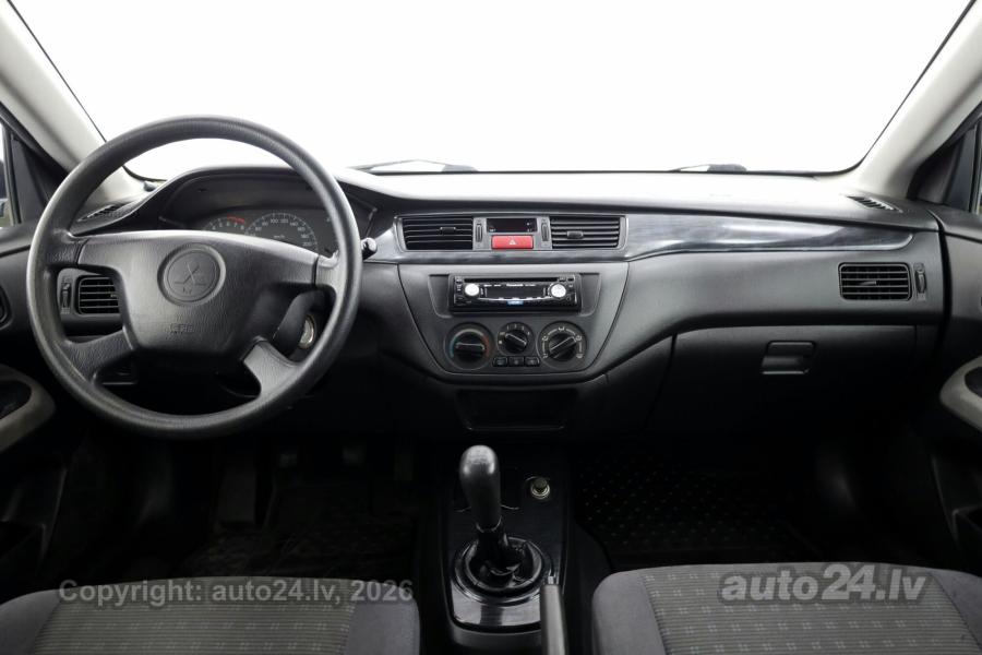 Grey Mitsubishi Lancer 2003 in Tallinn, with an engine capacity of 1.60 L and mileage of 163 thousand km for 1499 €, photo 6 on AUTOMOTO.COM.LV
