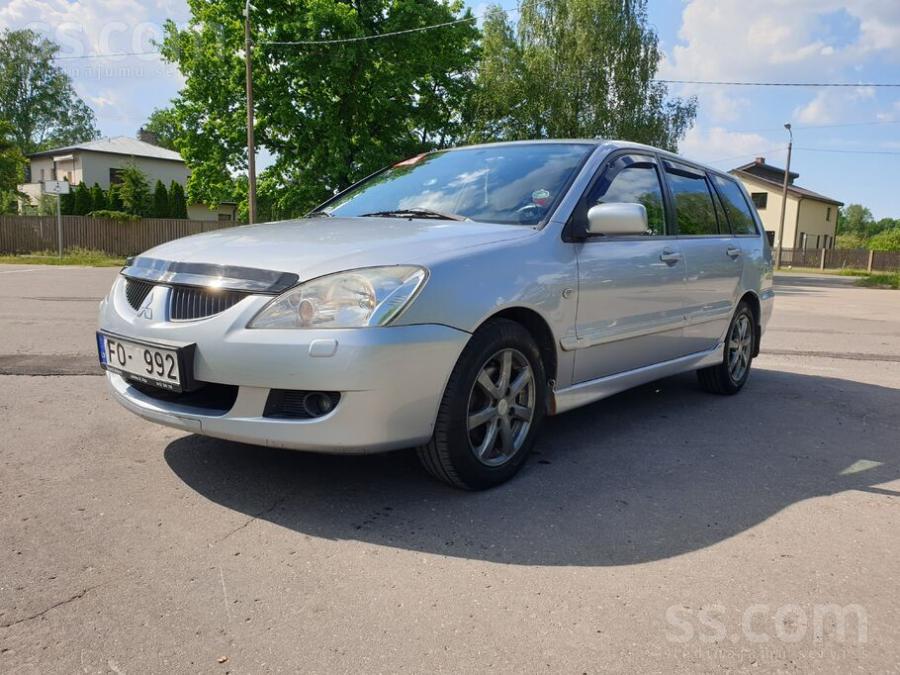 Grey Mitsubishi Lancer 2005 in Riga, with an engine capacity of 1.60 L and mileage of 130 thousand km for 1500 €, photo 7 on AUTOMOTO.COM.LV